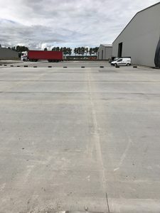 External concrete floor slab, for new plant storage facility, near ...