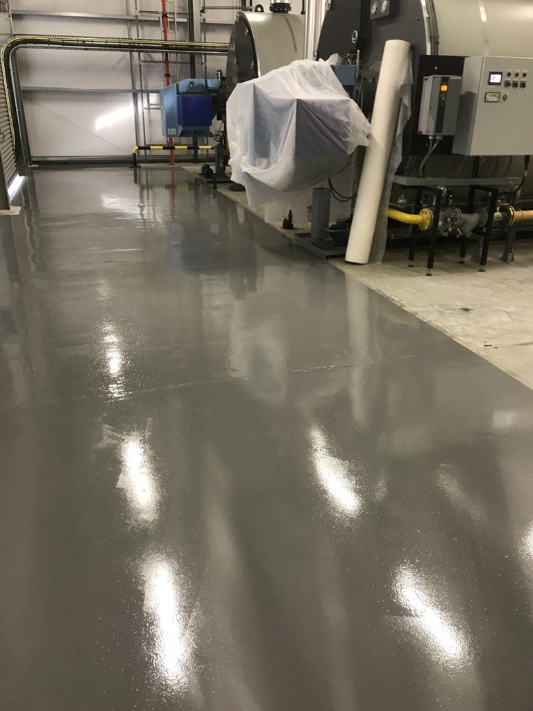 Repaired warehouse floor slab - Level Best Concrete Flooring