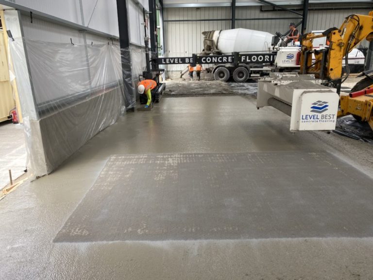 Laser Screed Warehouse flooring with dry-shake topping surface hardener ...